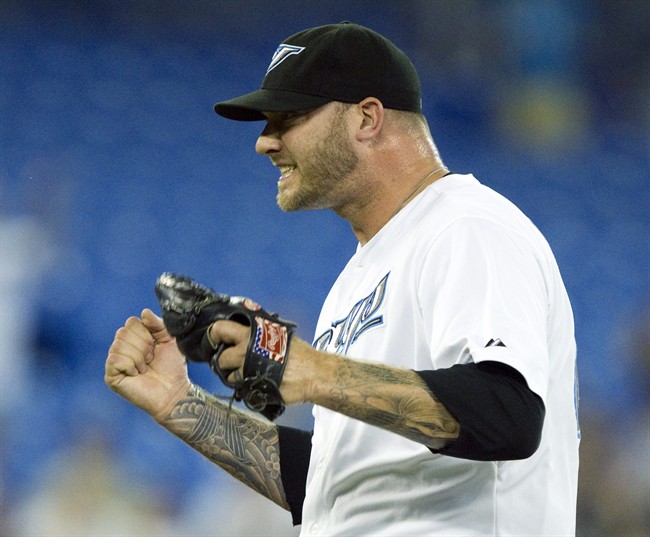 Davis hits two-run double as Jays sweep slumping Mariners with a 7-5 ...