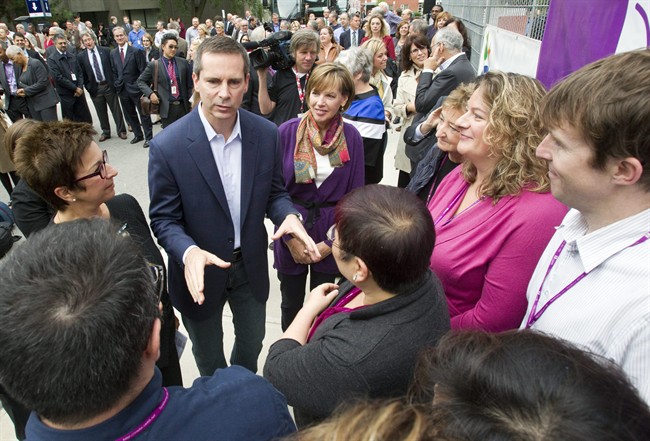 McGuinty urges Ontarians to elect party that knows how to deal with ...