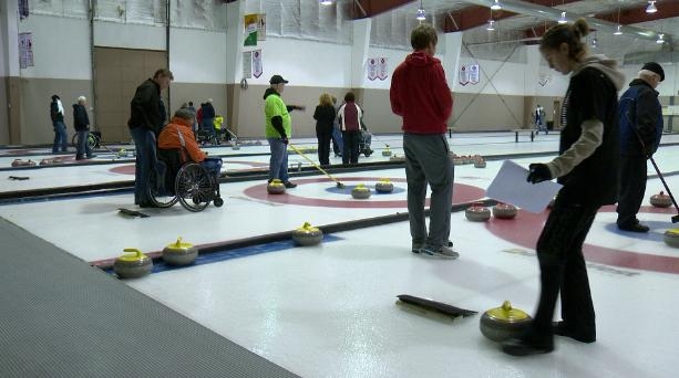 Wheelchair curling builds strength, independence for those with spinal ...