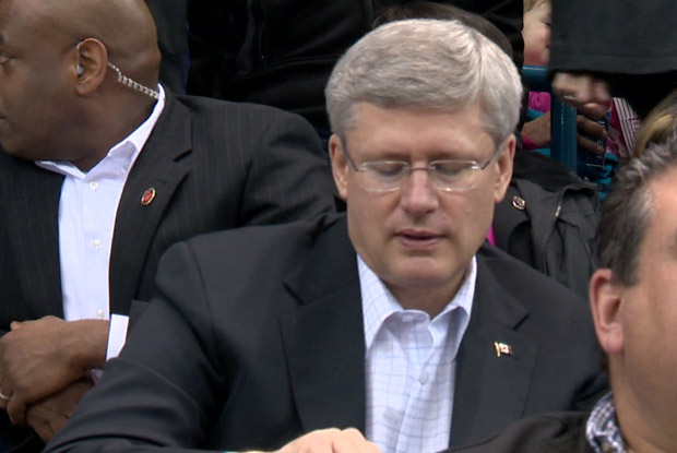 Prime Minister Stephen Harper turns heads during visit to Blades game ...