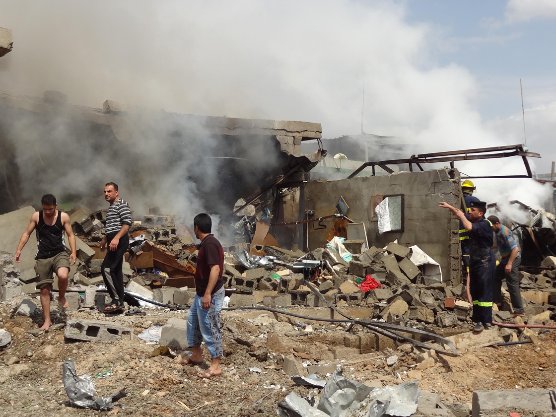 Iraqi officials say 2 separate explosions kill 4, wound 14 in Baghdad ...