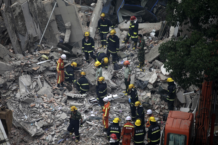 Explosion causes building collapse in China, killing 11 people; state ...