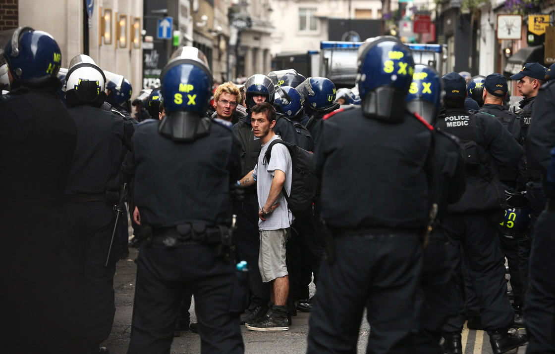 Riot police arrest 32 in London during protests against G-8 summit ...