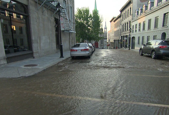 Watch: Water main break floods streets in Old Montreal - Montreal ...