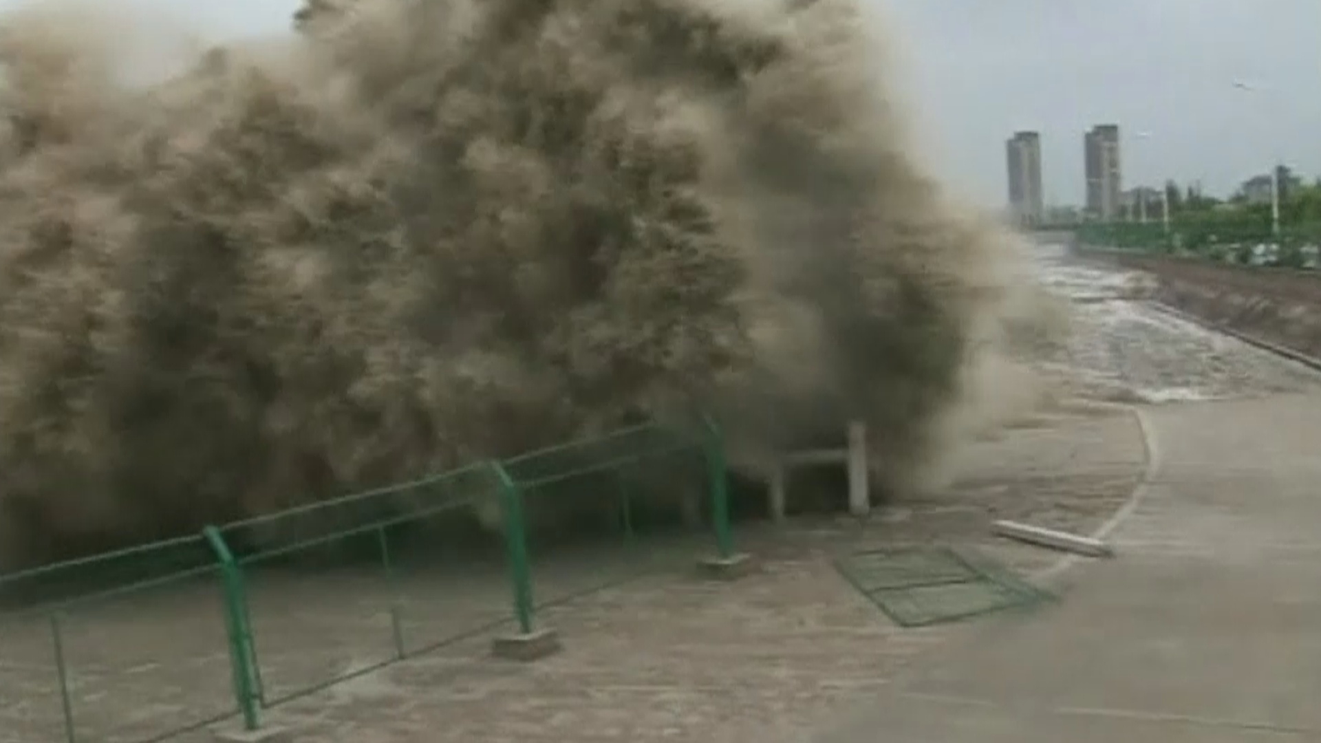 WATCH: Tidal wave in China sends people running for cover - National ...