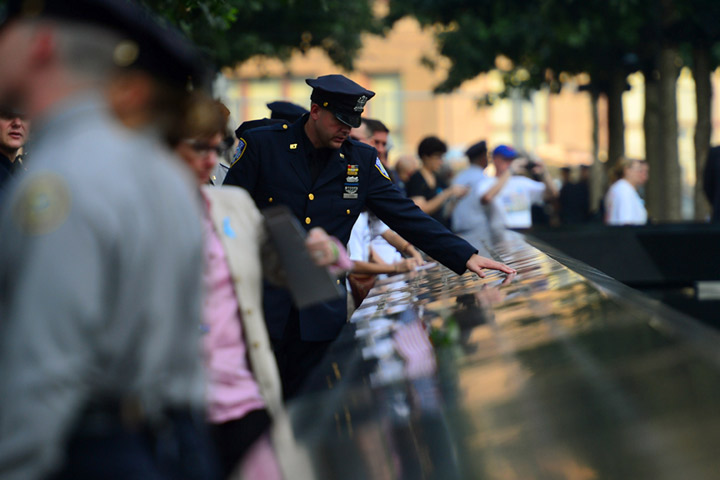 20 powerful and heartbreaking images as thousands mark 12th anniversary ...