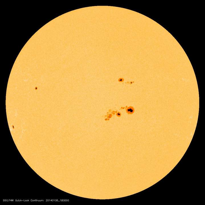 Giant sunspot erupts with large solar flare, chance of northern lights ...