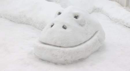 Giant snow dino drawing plenty of attention in Vegreville | Globalnews.ca