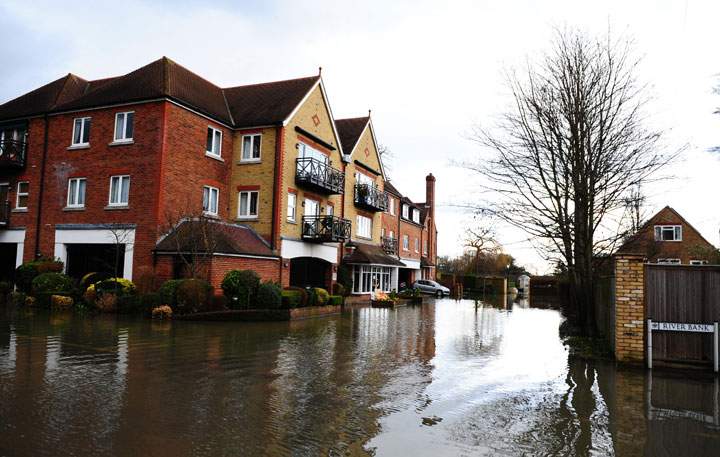 Gallery: River Thames breaches its banks near London - National ...