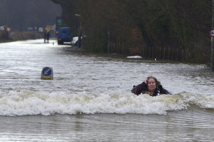 Gallery: River Thames breaches its banks near London - National ...