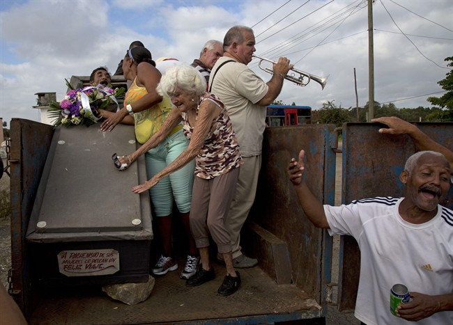 Cubans ‘bury’ man alive in mock funeral tradition - National ...