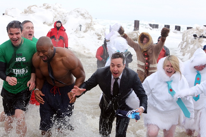 WATCH: Jimmy Fallon takes dip in chilly Lake Michigan for charity ...
