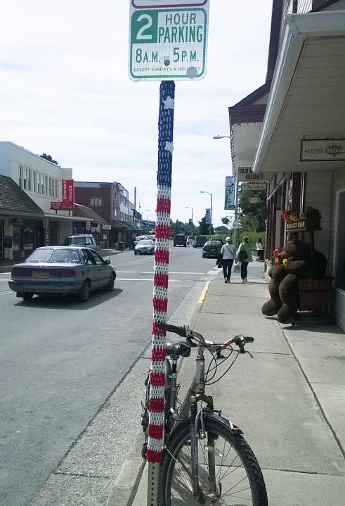 Knitter ‘yarn-bombs’ sign poles around Alaskan town - National ...
