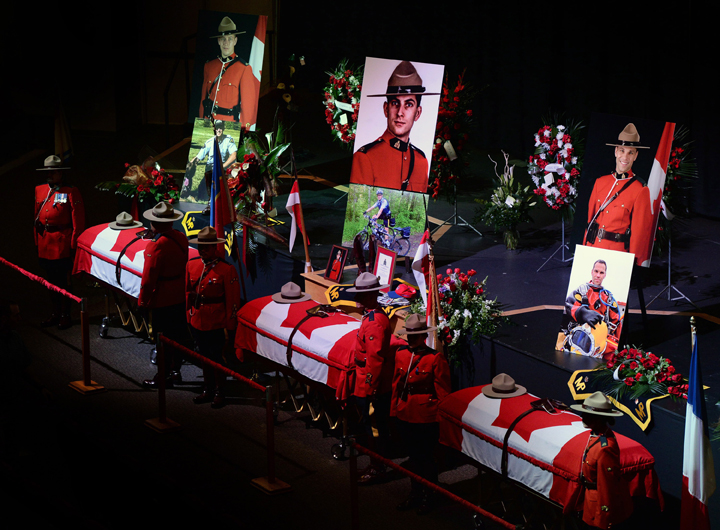 Thousands attend RCMP regimental funeral service for Moncton officers ...
