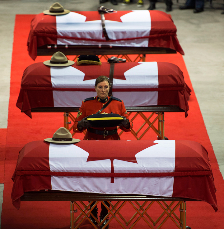 Thousands attend RCMP regimental funeral service for Moncton officers ...