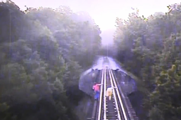 WATCH: Two women escape incredible near-miss with train - National ...