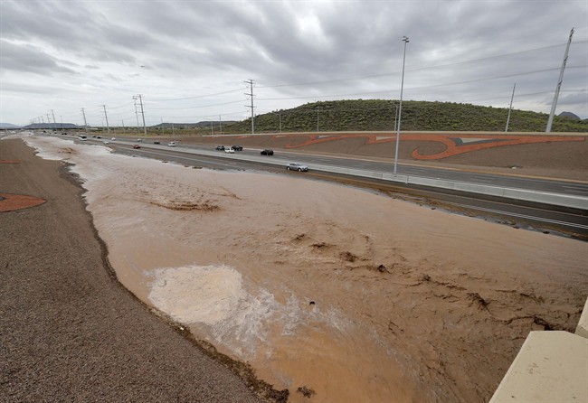 Flash flooding in Arizona leaves people stranded, without power ...