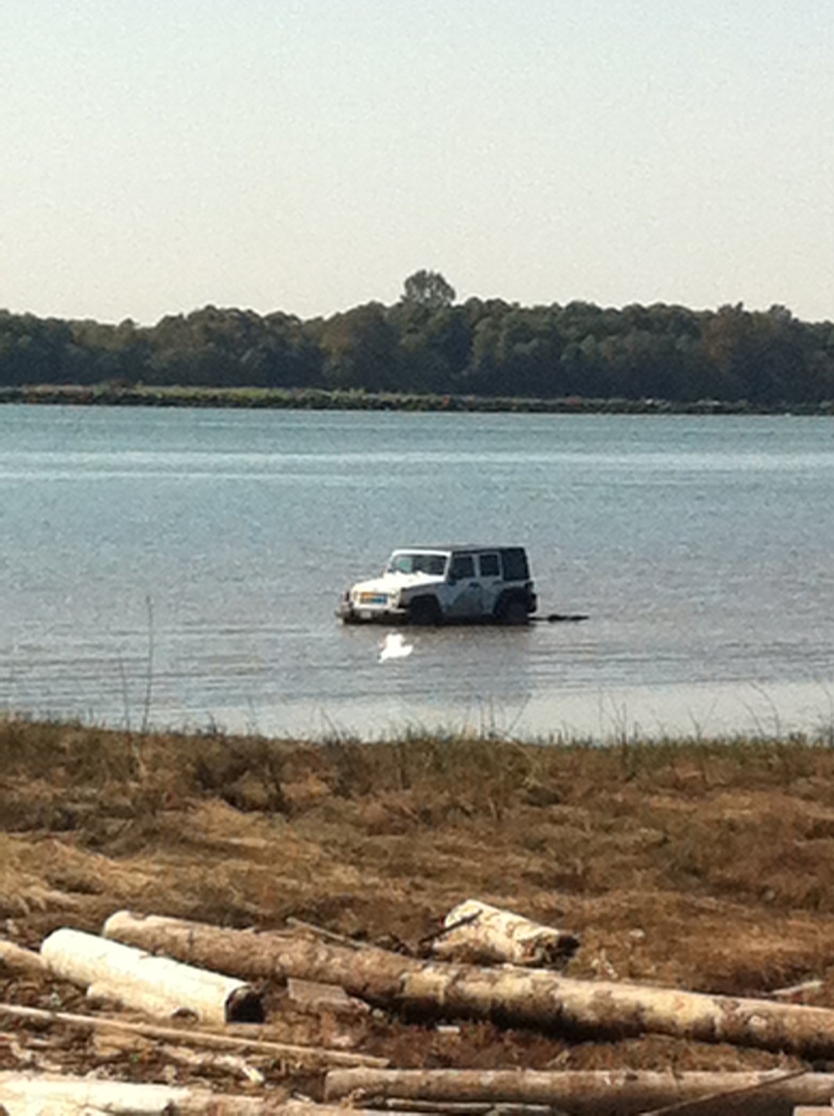 No charges for driver after photos of Jeep stuck in the mud go viral ...
