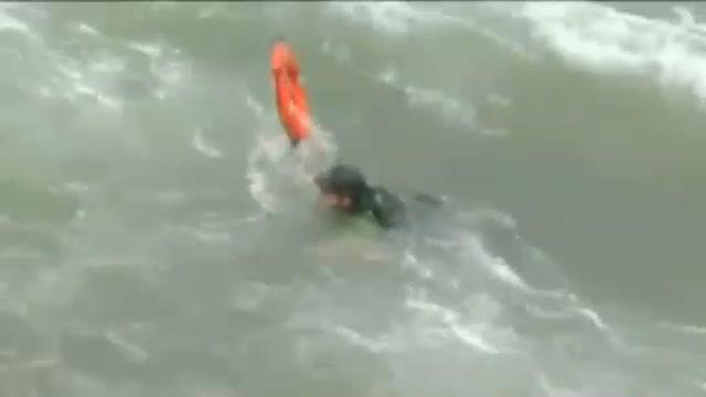 WATCH: Big wave rescue on Lake Michigan caught on camera - National ...