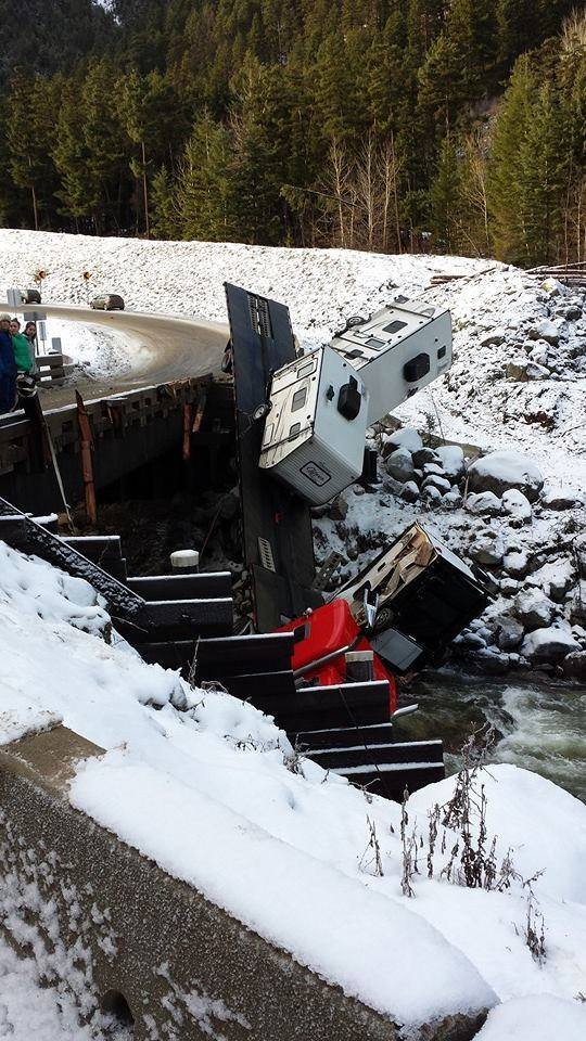 Truck driver alive after cab plunges into creek south of Lillooet ...