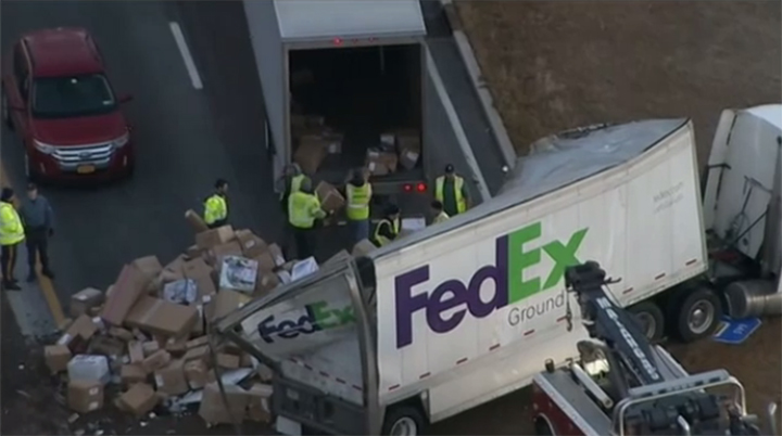 FedEx truck overturns on New Jersey highway, spills packages - National ...