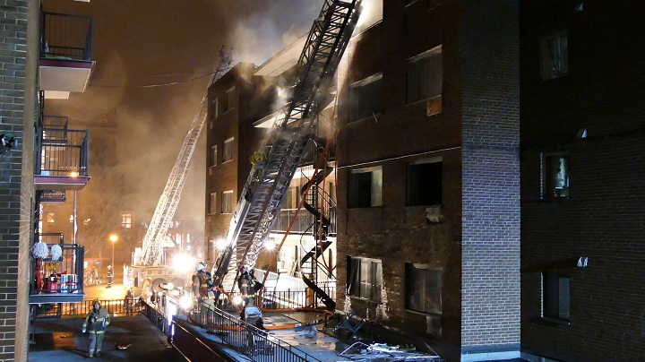 Four-alarm blaze leaves at least eight families homeless - Montreal ...