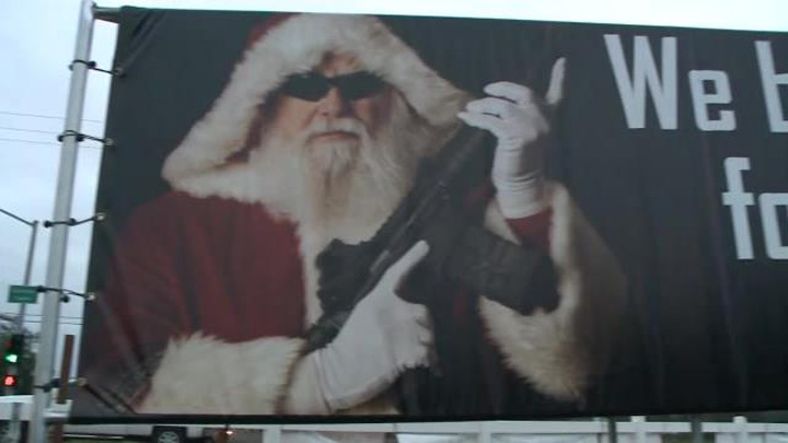 WATCH: Gun-toting Santa Claus billboard angers California residents ...