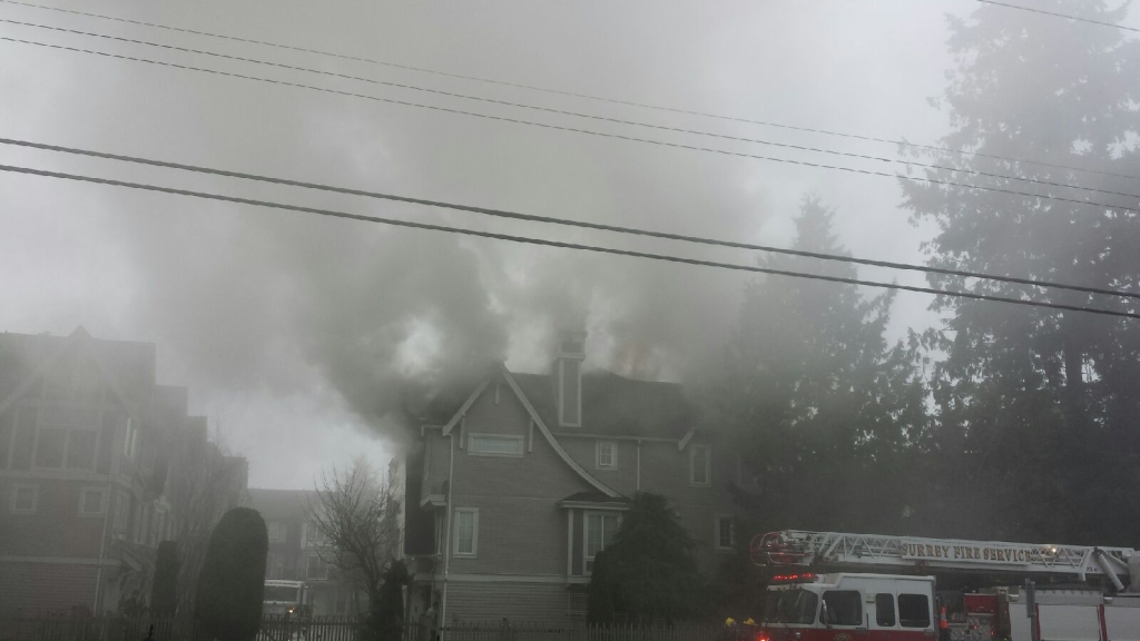 Four homes damaged in Surrey townhouse fire | Globalnews.ca