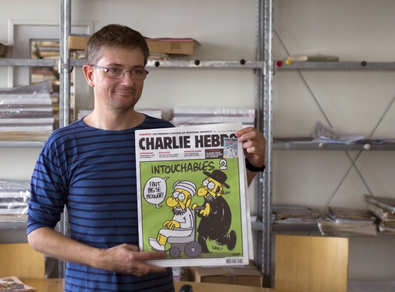 Remembering the victims of the Charlie Hebdo attack in Paris ...