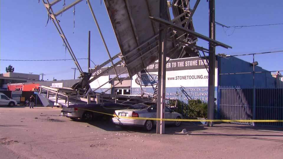 WATCH: Driver narrowly escapes collapsing billboard - National ...