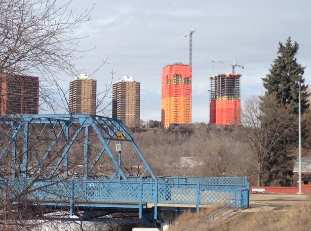 Three men taken into custody after alleged BASE jump off Edmonton crane ...