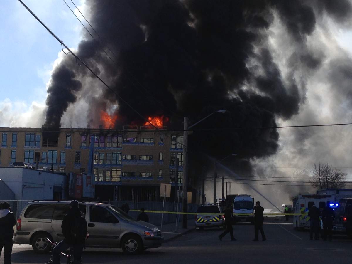 WATCH: Fire crews battle massive fire south of downtown | Globalnews.ca
