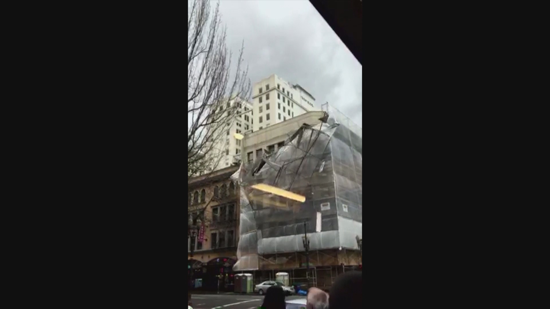 WATCH: Scaffolding comes crashing down due to strong winds in Portland ...