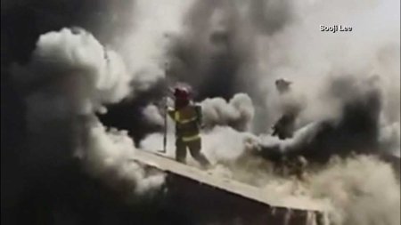 WATCH: Video shows moment firefighter falls through burning roof ...