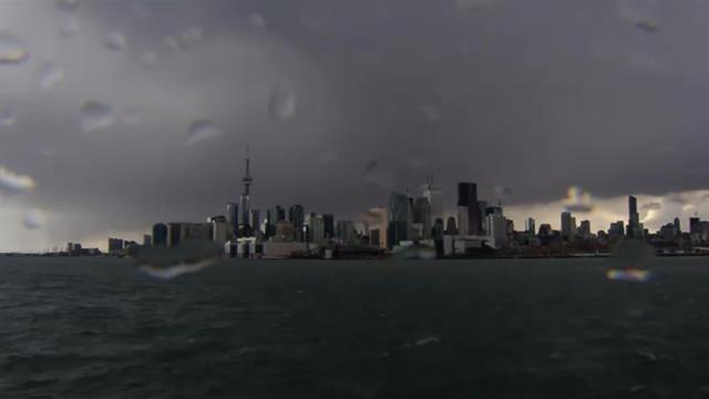 WATCH: Timelapse footage shows storm descend on Toronto | Globalnews.ca