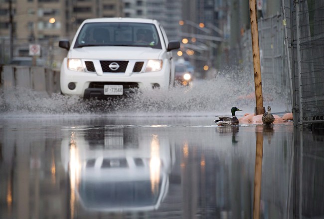 Flood warning issued for Toronto as intense rainstorm hits city ...