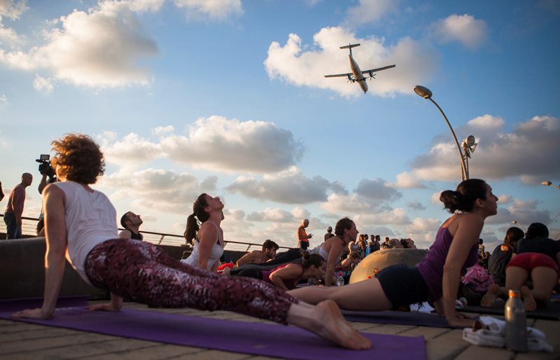 IN PHOTOS: Millions worldwide take to their mats on Yoga Day ...