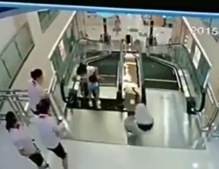 Woman dies from horrific escalator accident in China but saves son ...