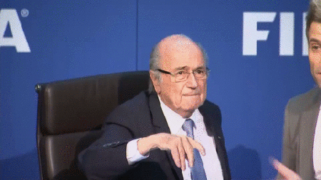 Blatter’s news conference delayed by British comedian throwing dollar ...