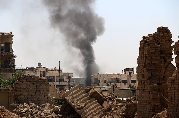 Report: US-led strikes in Iraq, Syria likely killed hundreds of ...