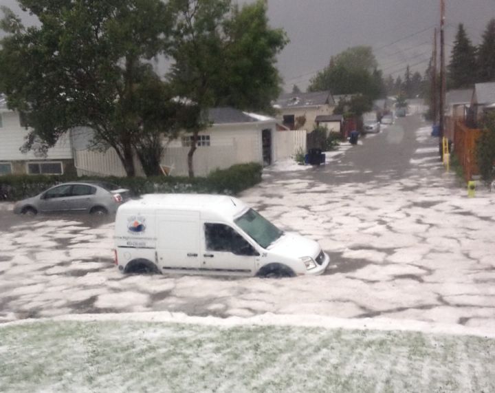 Flash flooding closes roadways as Calgary pummeled by hail storm ...