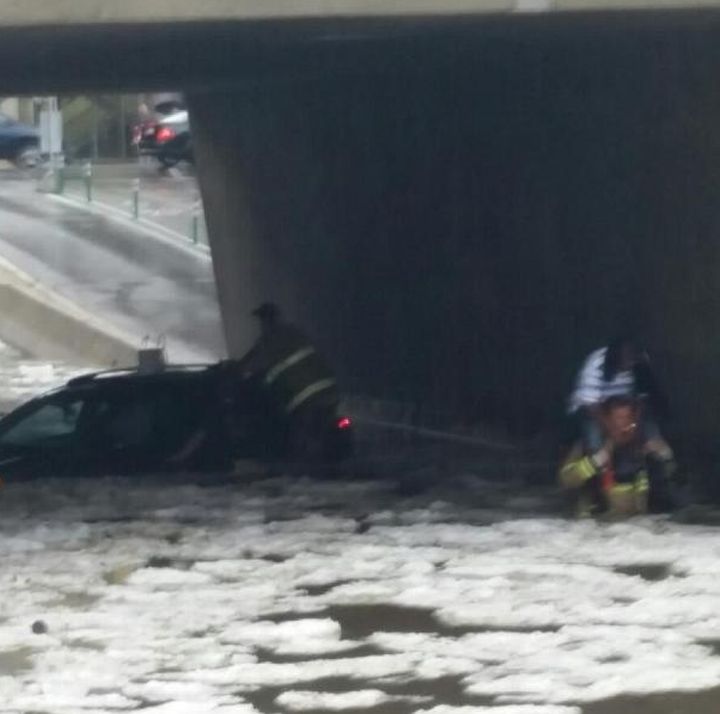 Flash flooding closes roadways as Calgary pummeled by hail storm ...