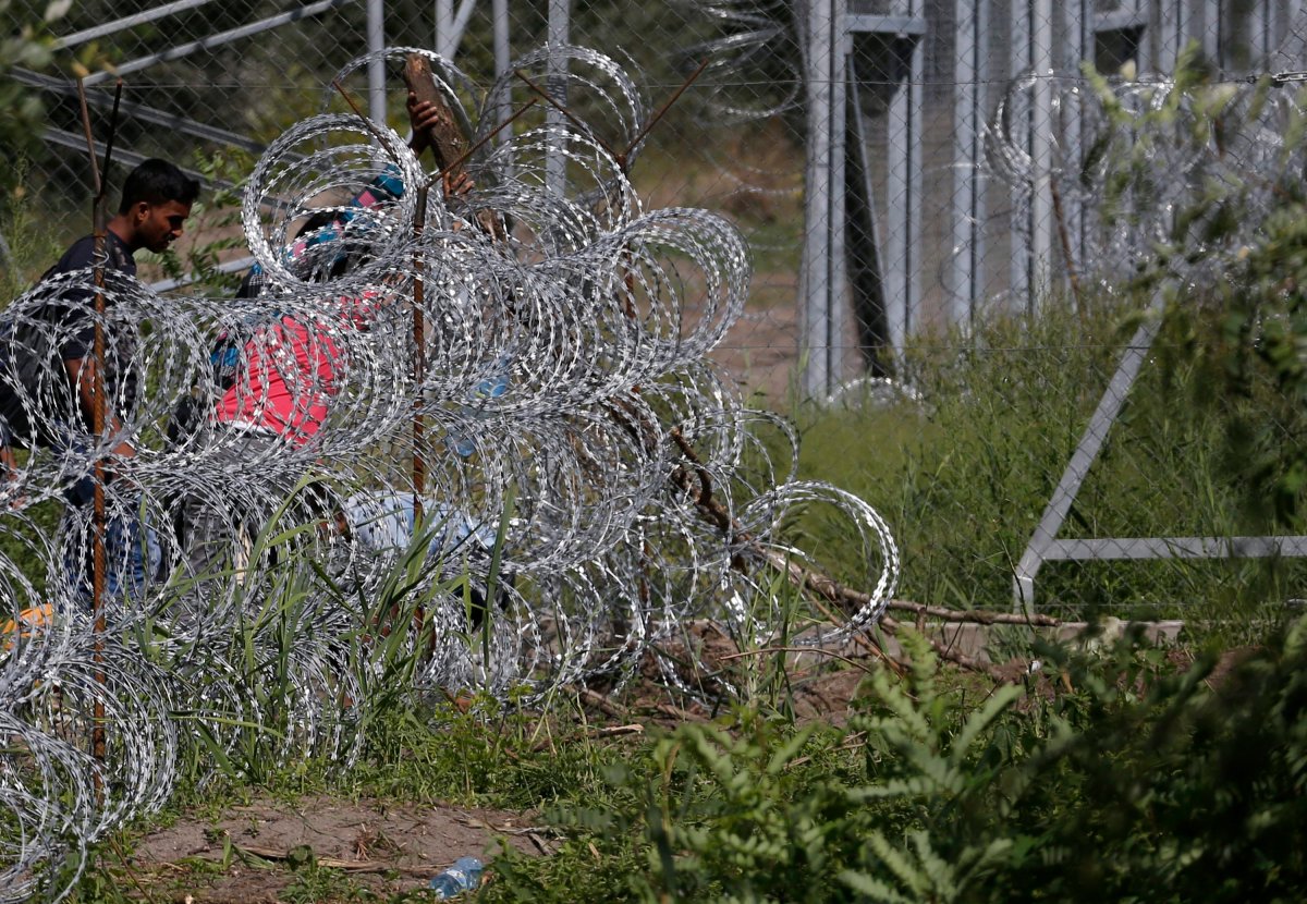 Migrants break through Hungary police lines near Serb border - National ...