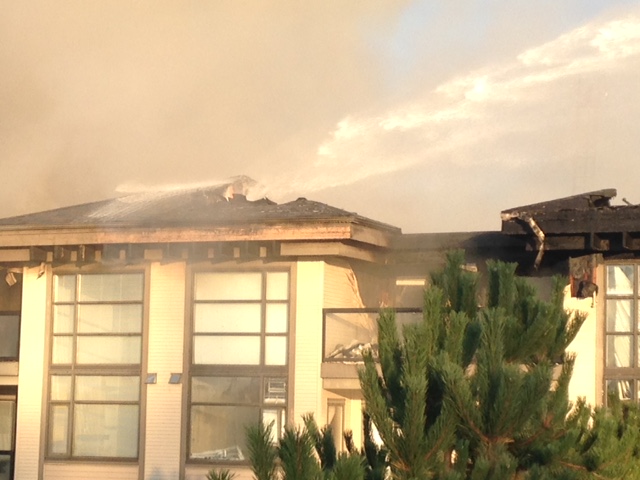 Crews battle fire at large apartment building in Surrey - BC ...