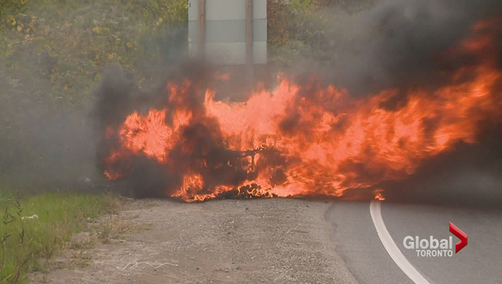 Audi SUV goes up in flames on Toronto highway minutes after being ...