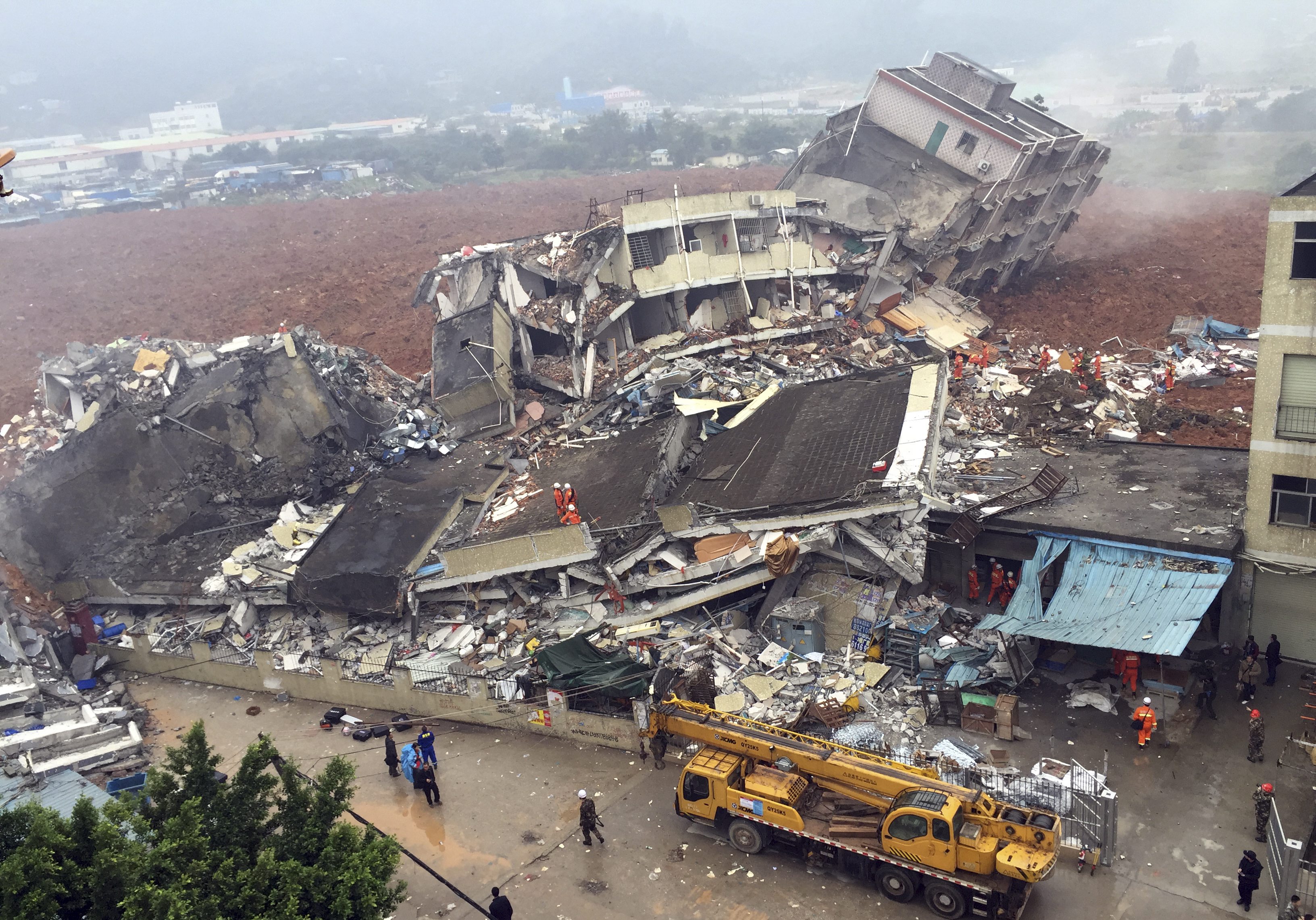 22 people missing, 900 evacuated after building collapses in China ...
