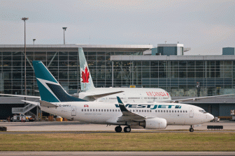 Air Canada, WestJet raising checked baggage fees - National | Globalnews.ca