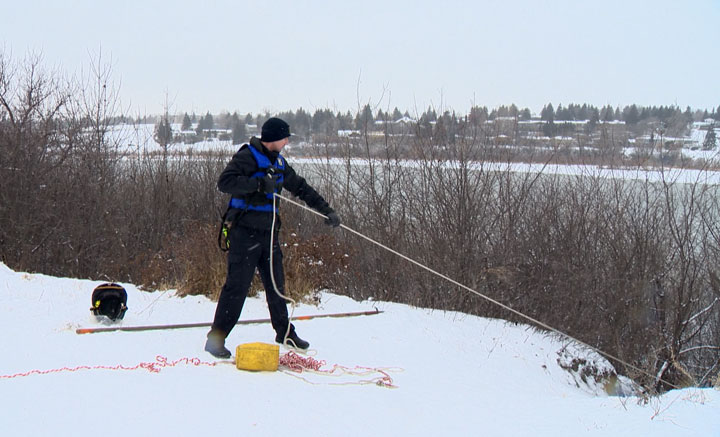 Rescuers recover dog that fell through river ice in Saskatoon ...