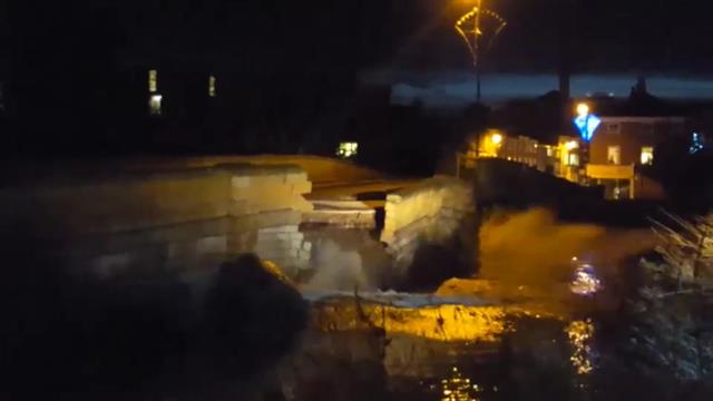 WATCH: Ancient bridge in the UK gets washed away by powerful flood ...