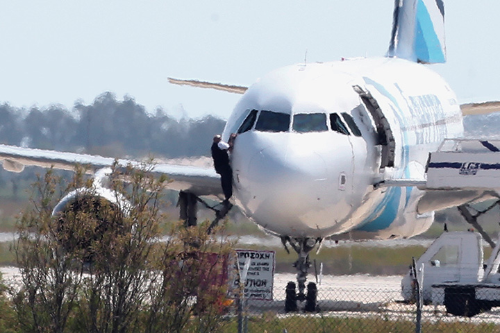 Hijacker of EgyptAir flight arrested, hostage situation over - National ...